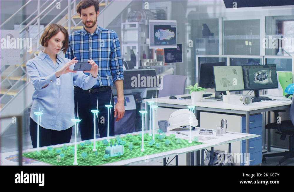 Two Engineers Use Augmented Reality to build Wind Turbine Park Stock ...