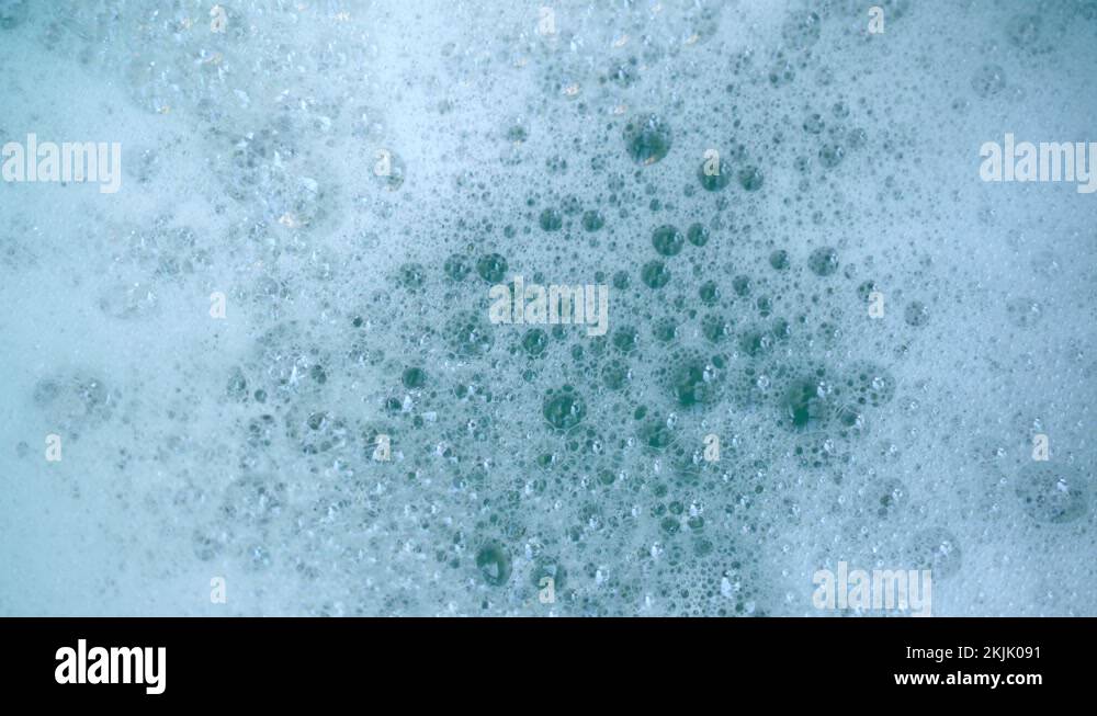 Top view of foamy soapy water texture. White suds and clean water Stock ...