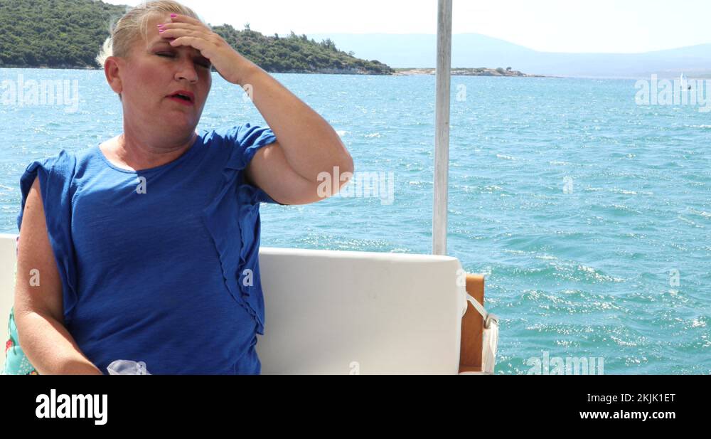 Woman feeling sick and vomiting during the boat travel 2 Stock Video ...