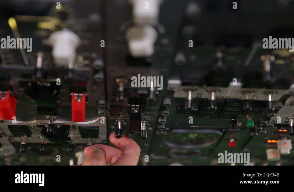 The cockpit of a passenger airplane. Multiple buttons on a planes ...