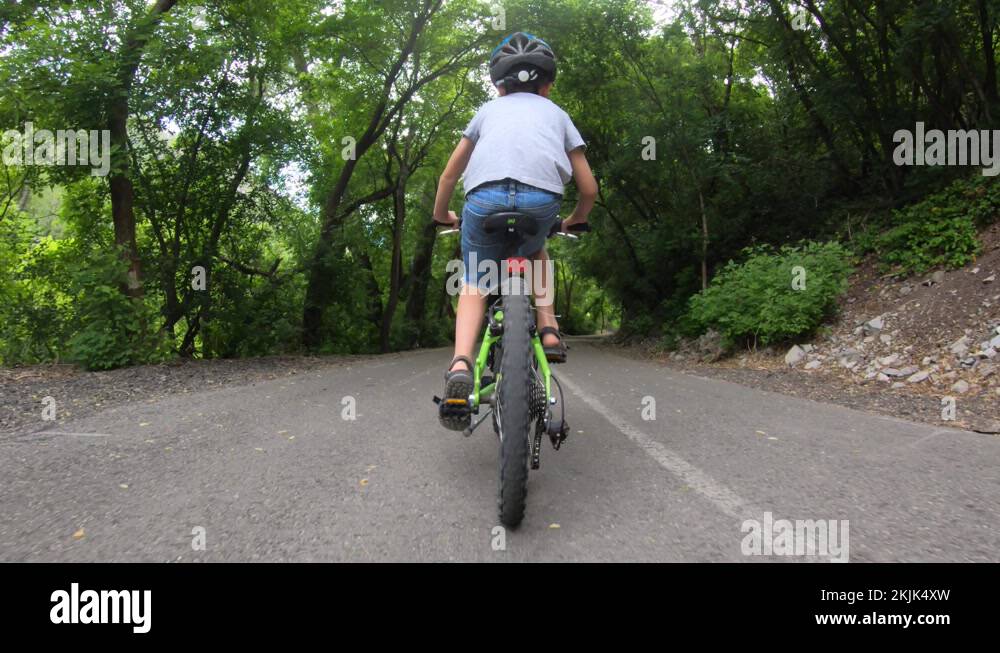 Children riding bikes on trail Stock Videos & Footage - HD and 4K Video ...