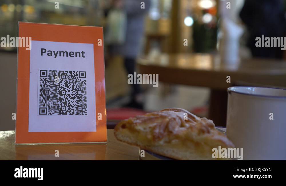 QR code payment display in the retail store. Shopping and E-commerce ...