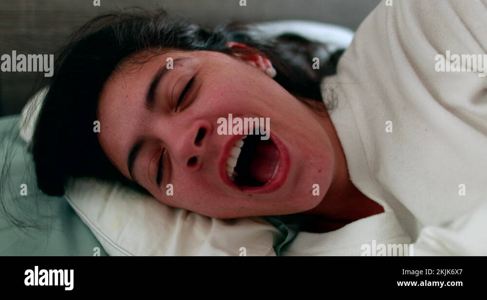 Woman yawning stretching in bed Stock Videos & Footage - HD and 4K ...