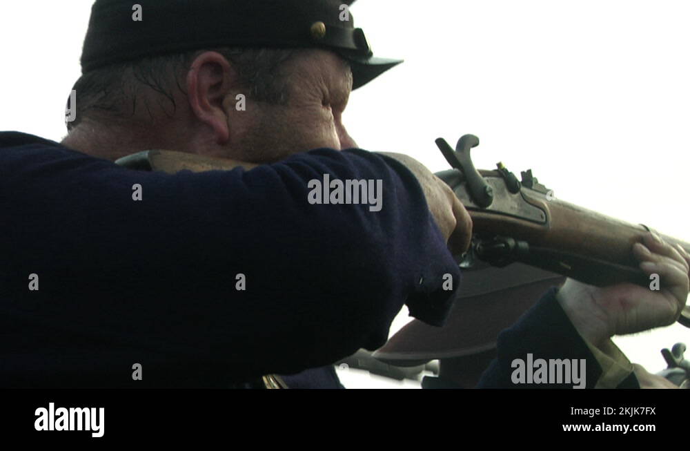 Civil War Union soldiers firing and fighting muskets in reenactment ...