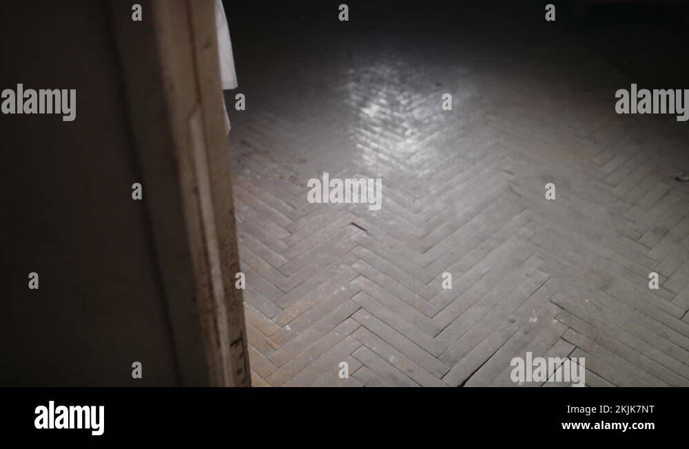 Exhorcist girl in white shirt slowly creeping in haunted hallway ...