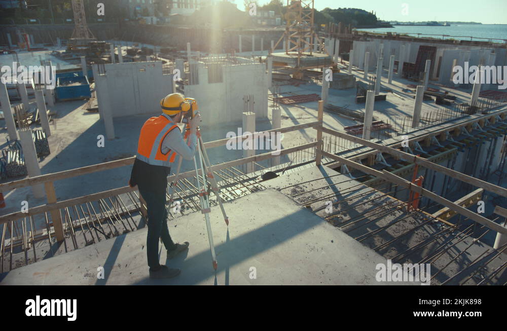 Construction Worker Using Theodolite Surveying Instrument Stock Video ... Construction Worker Using Theodolite Surveying Instrument Stock Video ...