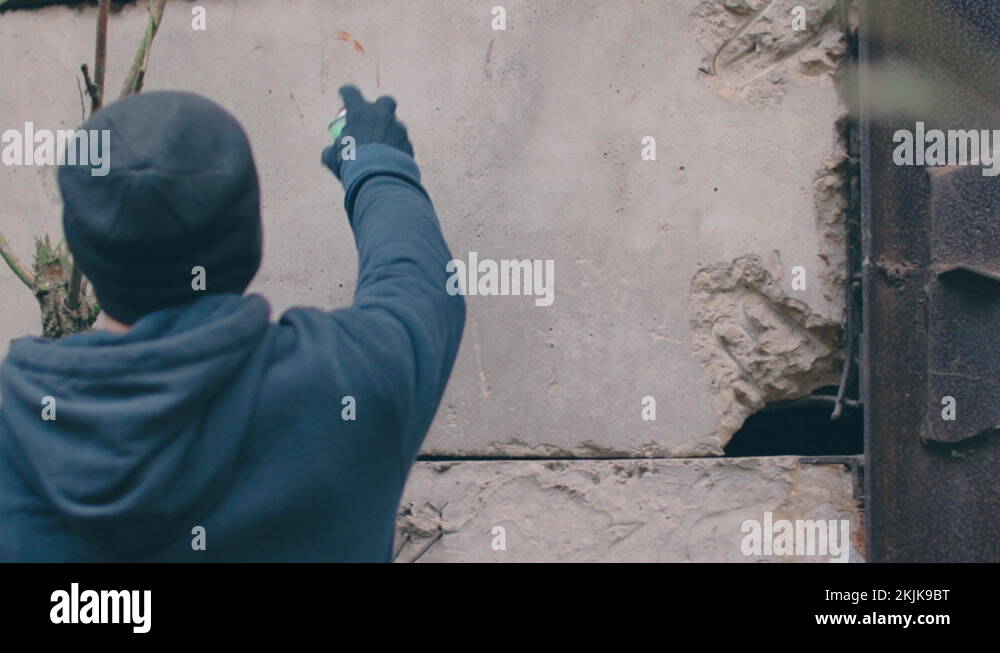 Graffiti vandalism writing on wall street art Stock Videos & Footage ...