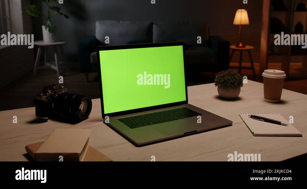 Close up shot of modern chroma key green screen laptop computer set up ...