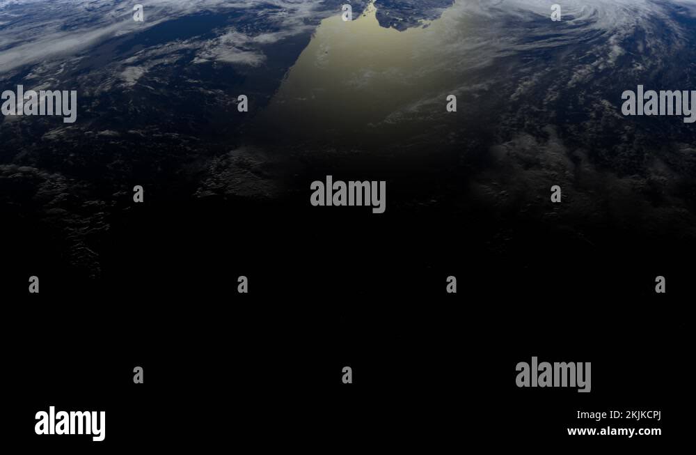 Earth from space. Sunrise. The sun slowly illuminates the earth ...