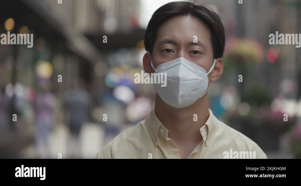 Young Asian man taking off a mask smiling happy coronavirus covid Stock ...