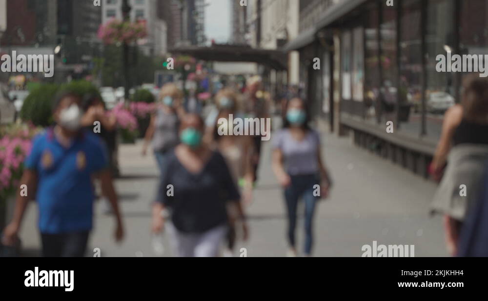 Covid 19 people wearing masks crowd Stock Videos & Footage - HD and 4K ...