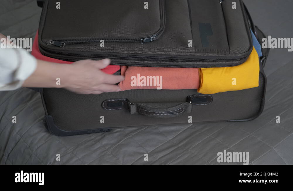 Packing suitcase Stock Videos & Footage - HD and 4K Video Clips - Alamy