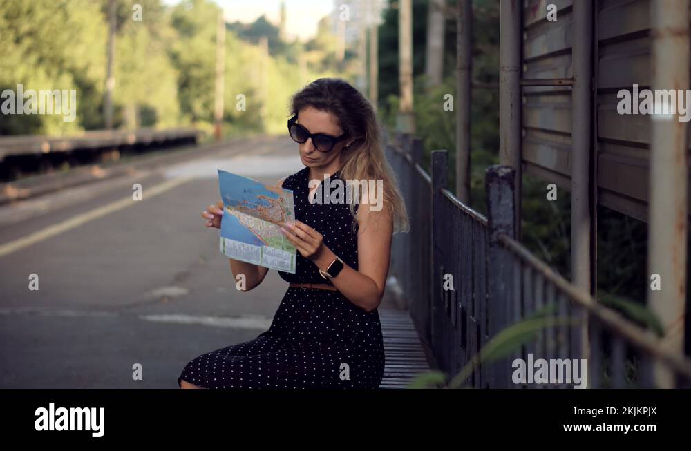 Female Traveler Waiting Train With Map.Travel Tourist Exploring City Route Map Stock Video ...