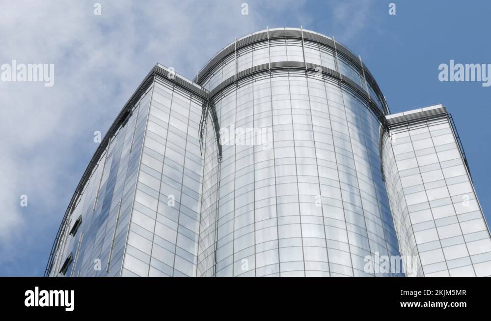 Modern building with reflection of sky and clouds Stock Videos ...