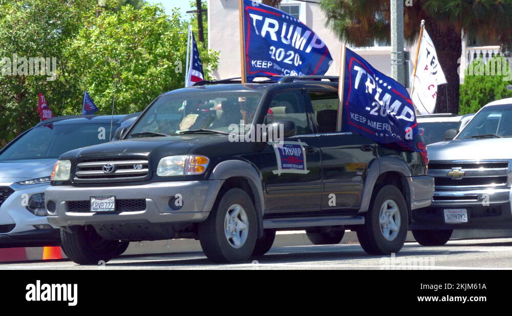 President Donald Trump supporters in cars with flags driving in Los ...