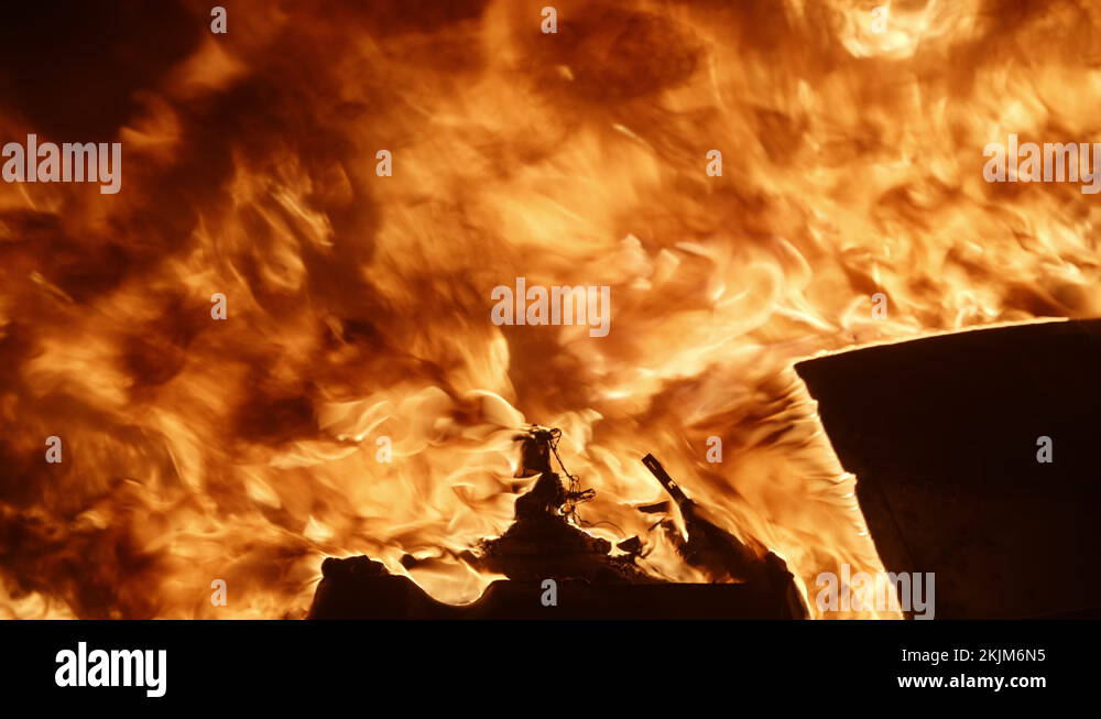 Close-up of old TVs burning on fire. Destruction of retro TV. Burning ...