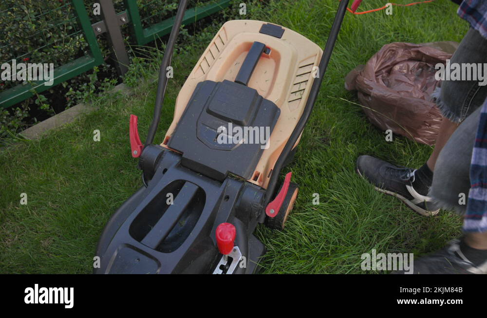 Boy cutting grass Stock Videos & Footage - HD and 4K Video Clips - Alamy