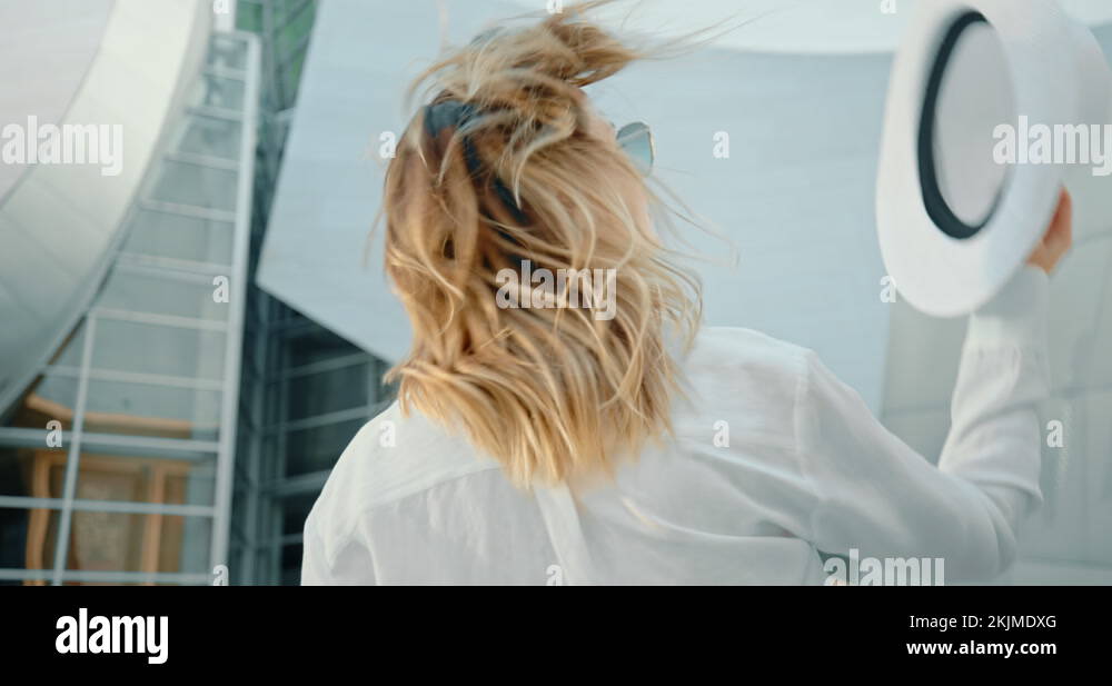 Woman shaking hair in slow motion 4K. Modern balayage hair color and ...