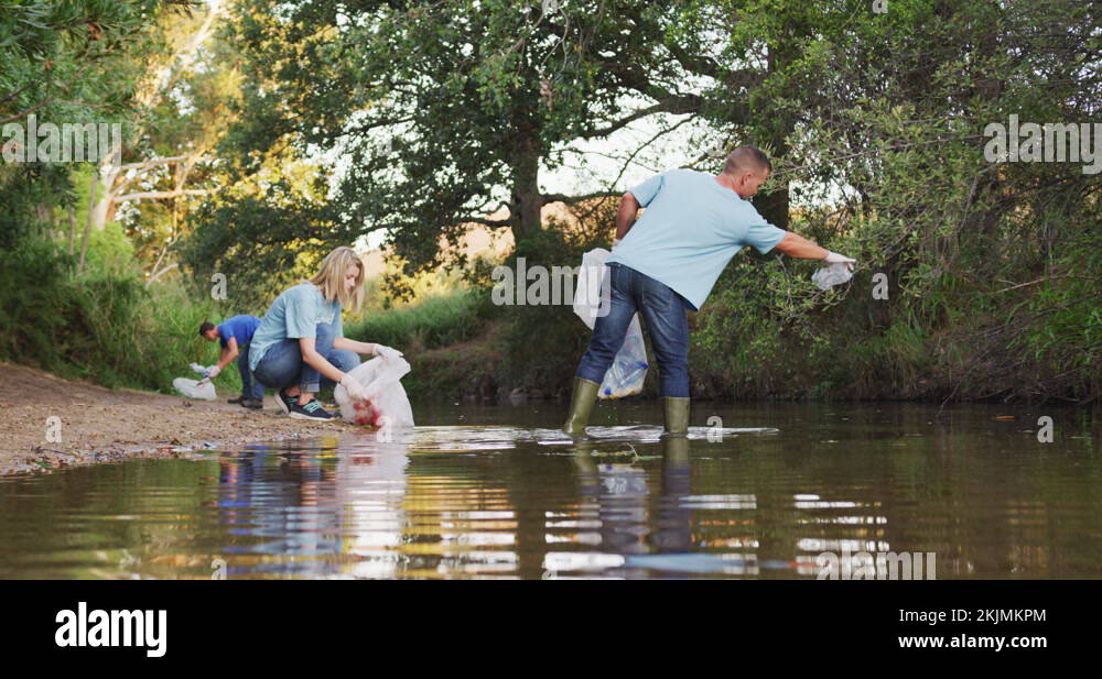 People picking trash in river Stock Videos & Footage - HD and 4K Video ...