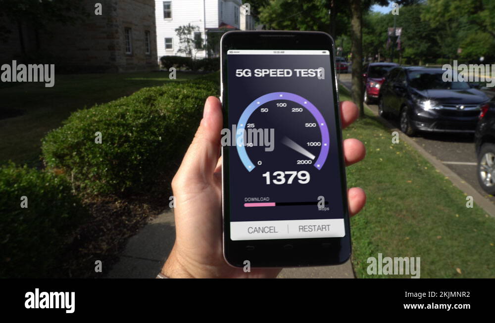 Man Tests 5G Download Speeds on Smartphone in Small Town Stock Video ...
