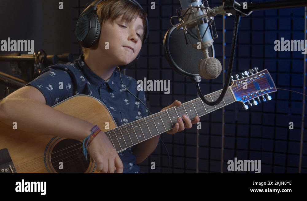 Kids playing guitar singing Stock Videos & Footage - HD and 4K Video ...