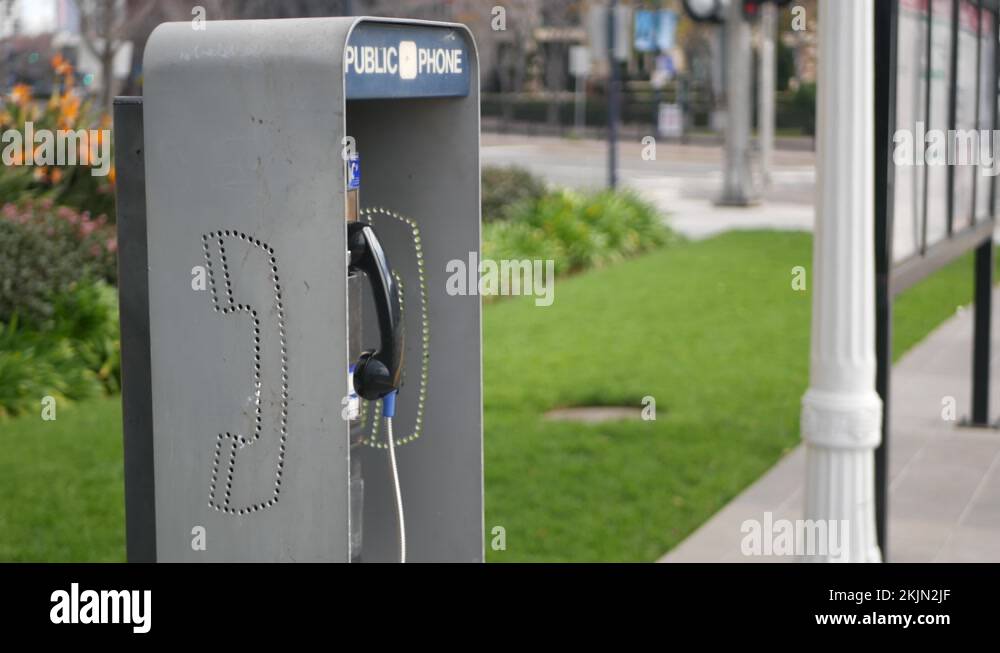 Retro coin-operated payphone station for emergency call on street ...
