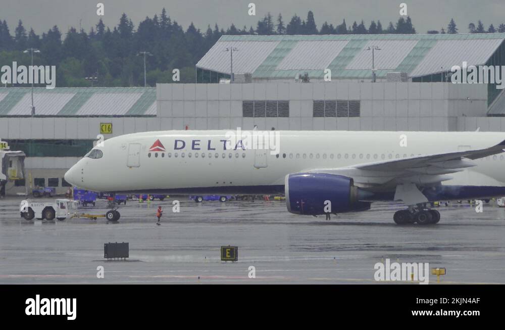 Push-back and engine startup of a Delta Airlines Airbus A350-900 Stock ...