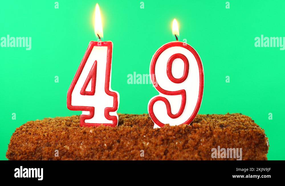Cake with the number 49 lighted candle. Chroma key. Green Screen ...