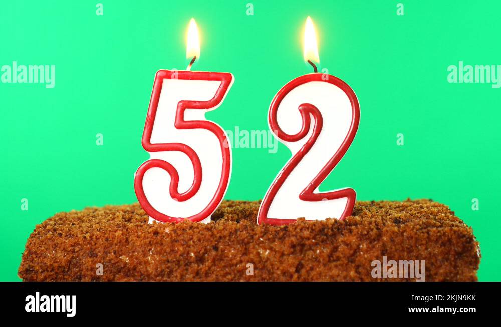 Cake with the number 52 lighted candle. Chroma key. Green Screen ...