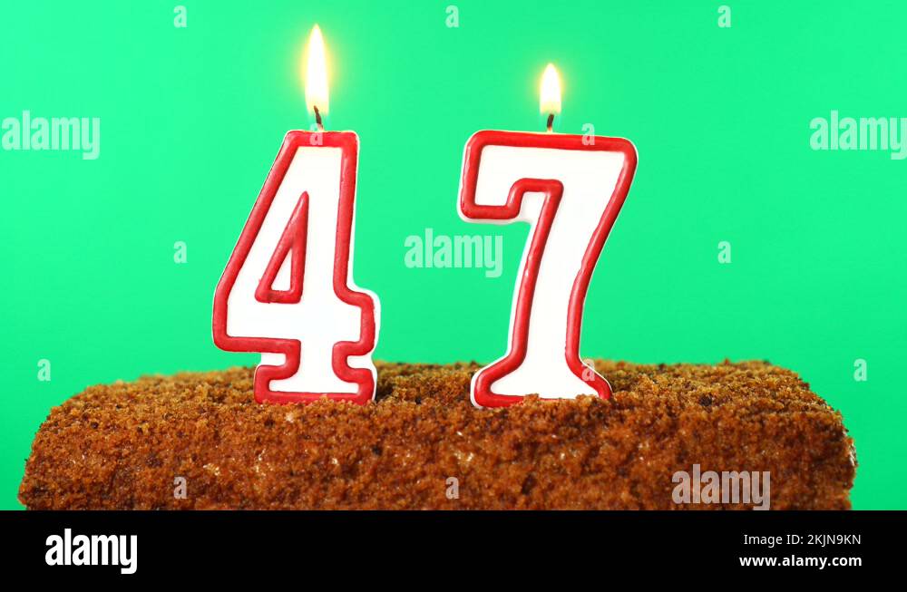 Cake with the number 47 lighted candle. Chroma key. Green Screen ...