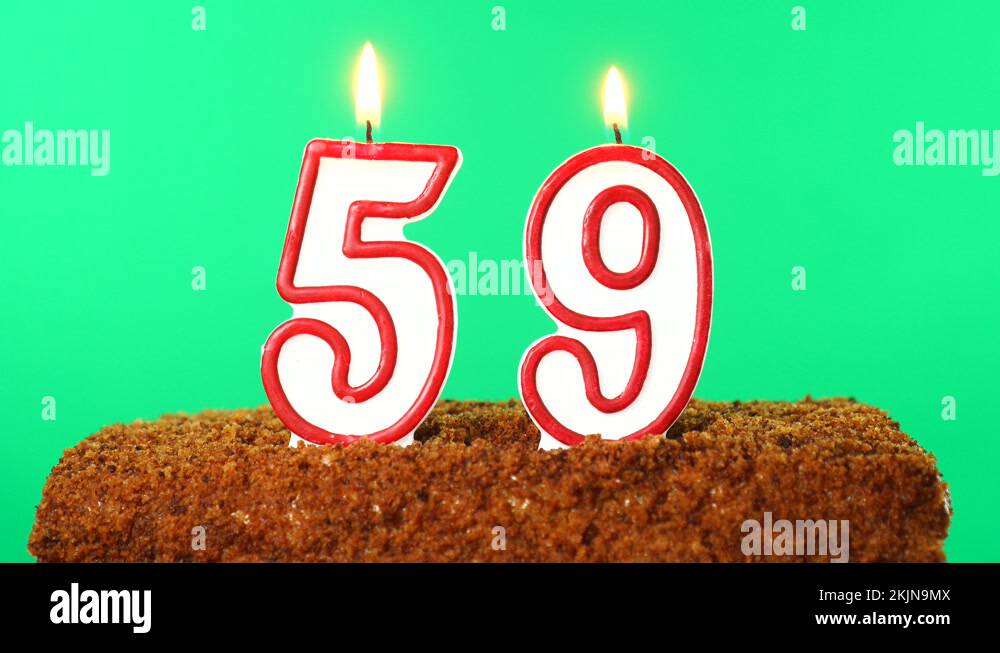Cake with the number 59 lighted candle. Chroma key. Green Screen ...