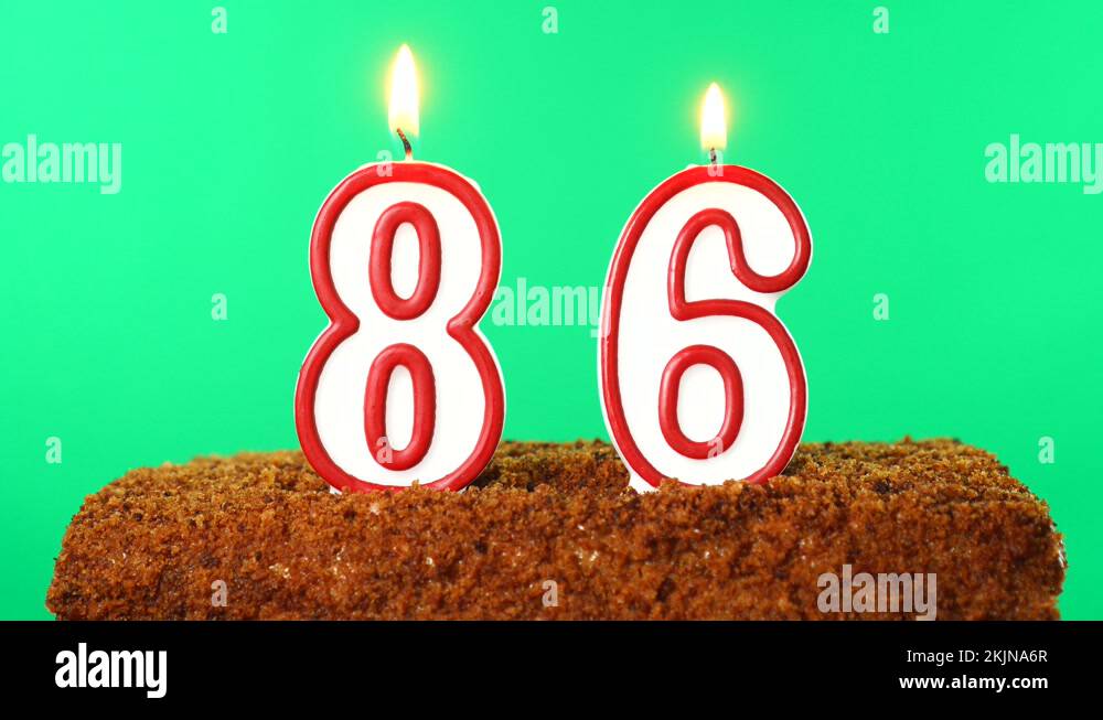 Cake with the number 86 lighted candle. Chroma key. Green Screen ...
