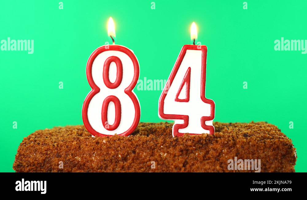 Cake with the number 84 lighted candle. Chroma key. Green Screen ...