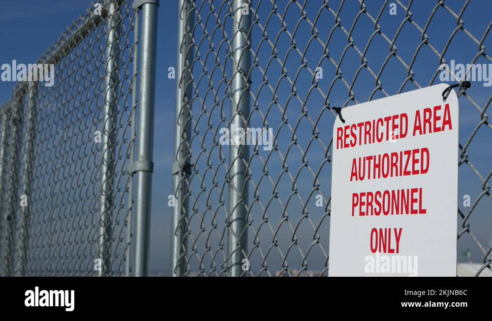 Restricted area, authorized personnel only sign in USA. Red letters ...