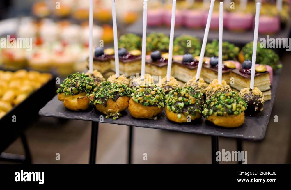 muffin and other sweets on the buffet table during the coffee break ...