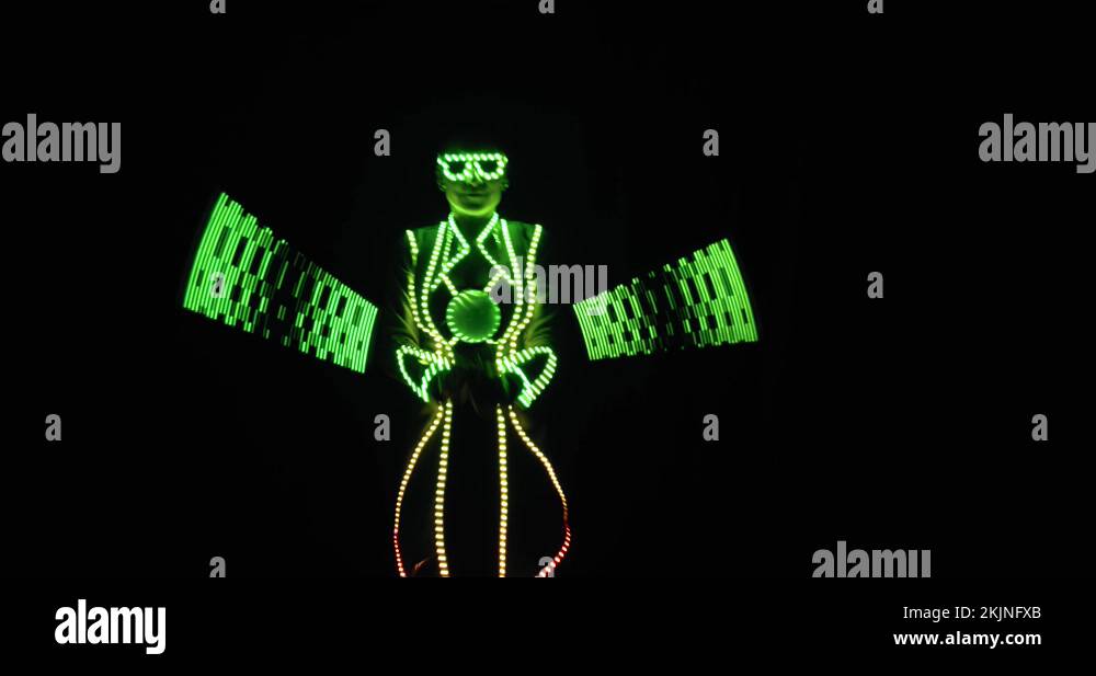 GO GO dancer at the club. LED lights all over a woman dancing, light ...