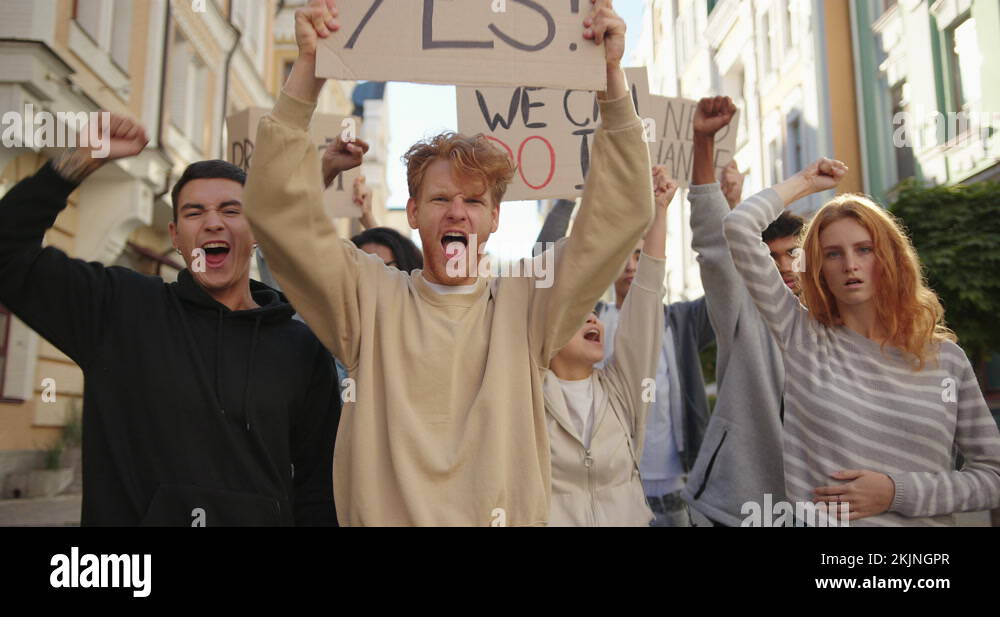 Public demonstration of angry activists students with posters at city ...