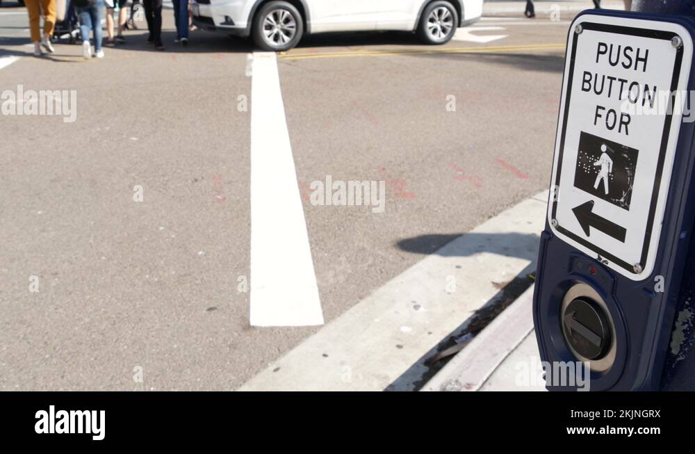 Traffic light button on pedestrian crosswalk, people have to push and ...