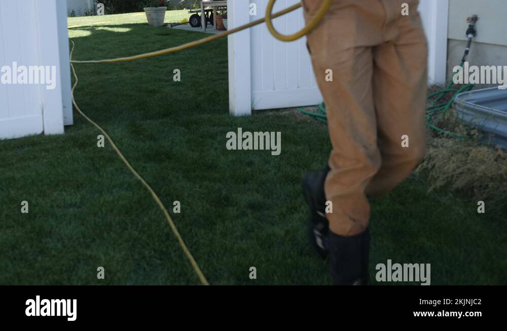 Pulling hose Stock Videos & Footage - HD and 4K Video Clips - Alamy