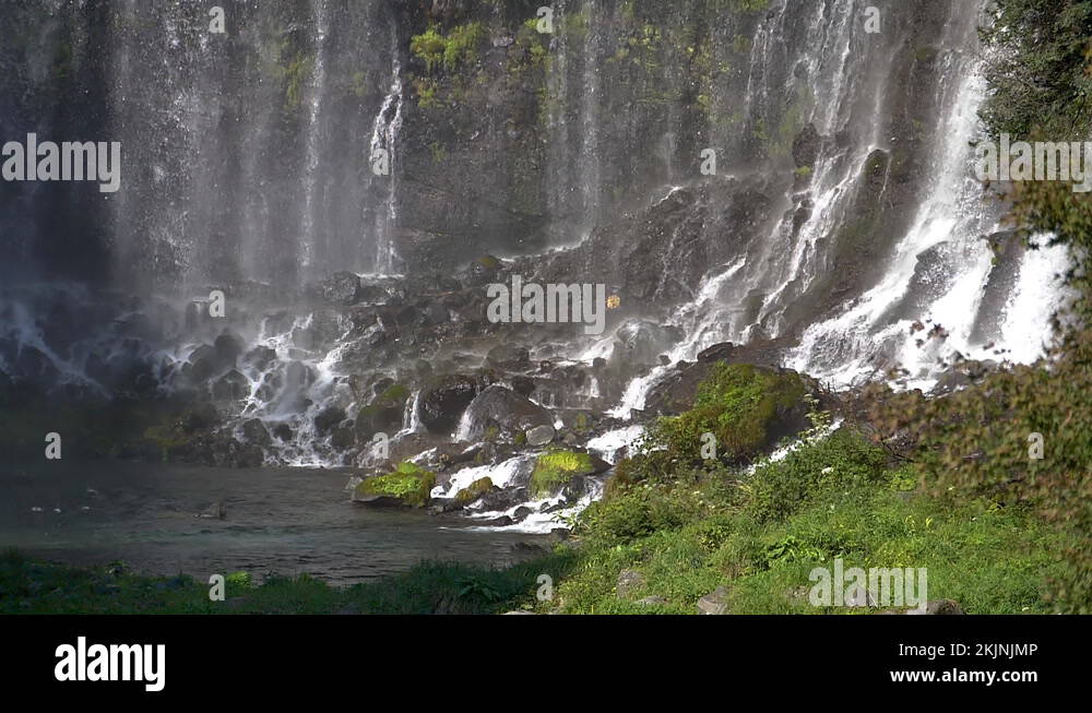 Big rocks on the bottom of the falls in Shiraito falls in Japan Stock ...