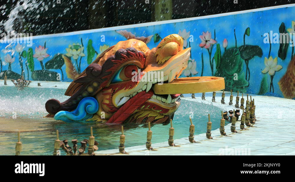 A big statue dragon at Suoi Tien park in Ho Chi Minh Vietnam handheld ...