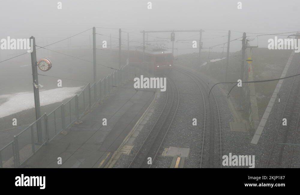 Gornergrat bahn cog railway train top view arriving at 3100m summit ...
