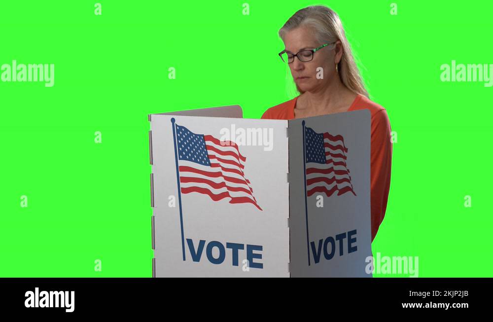 Conceptual portrait green screen with smiling woman making decision in ...