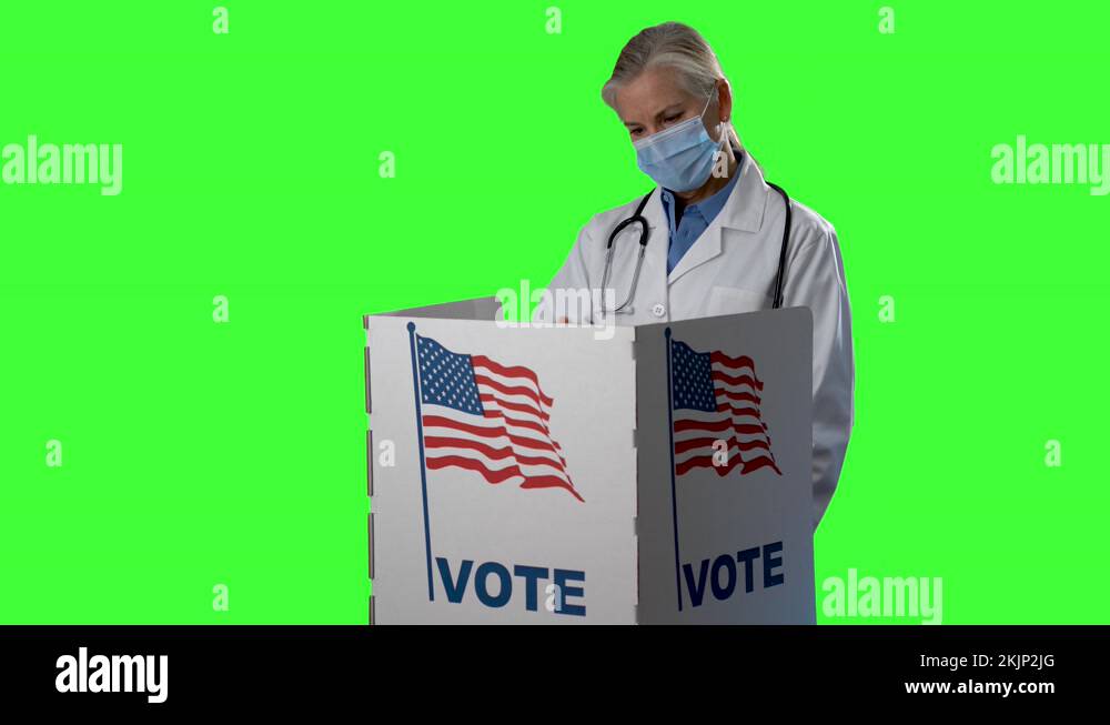 Conceptual portrait green screen with smiling female doctor in voting ...