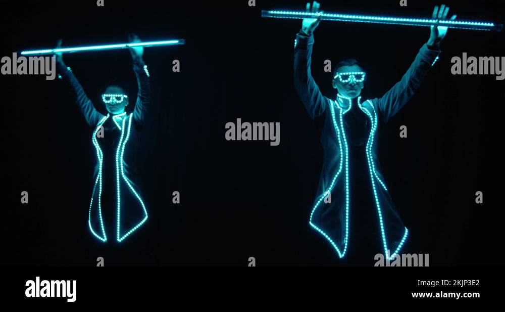 Two people are performing a light show on stage of the nightclub, 4k ...