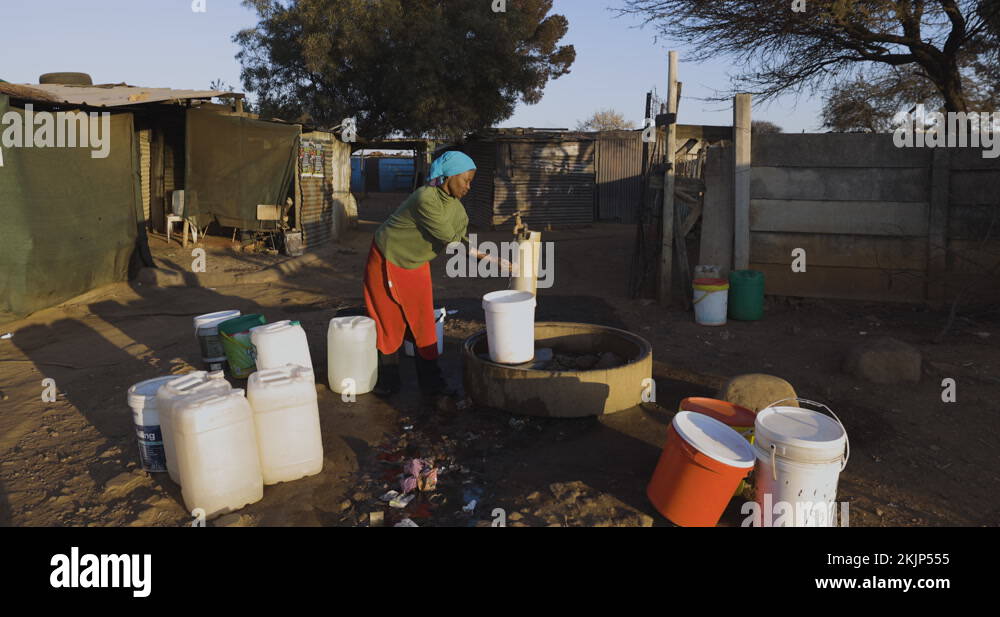 Face of poverty. Poor Black African woman with no access to running ...