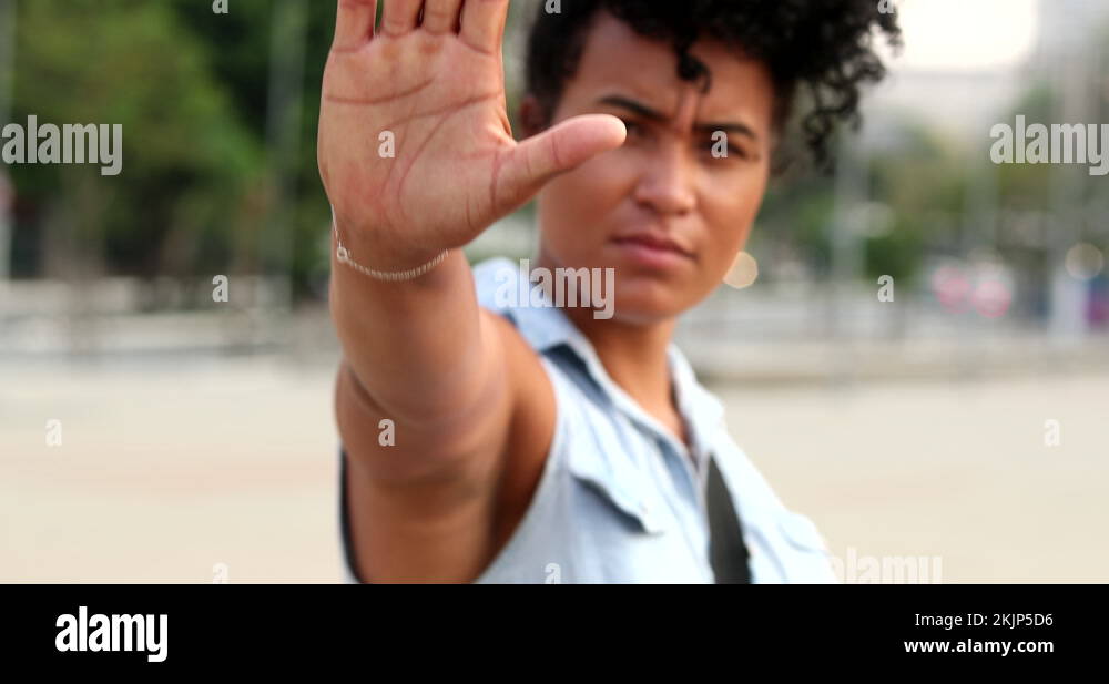 Blackoman annoyed making stop sign with hand, saying no, expressing ...