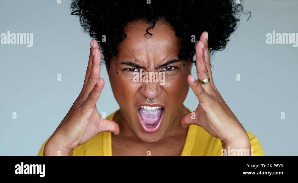 Portrait angry black woman yelling at camera Stock Video Footage - Alamy