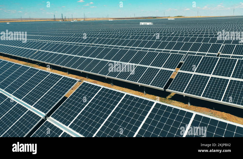 Rows of solar panels installed in the field. Solar cells, renewable ...