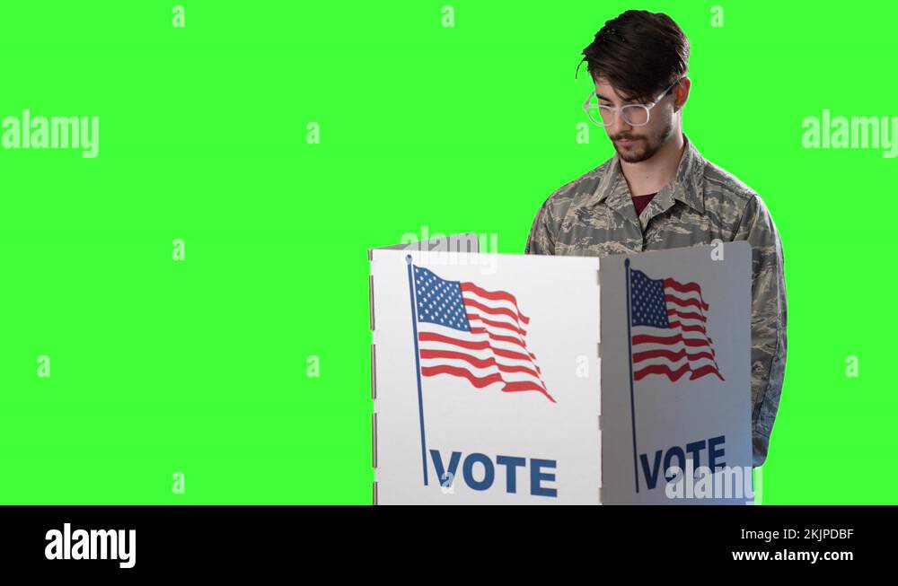 Conceptual portrait green screen background with smiling teen man in ...